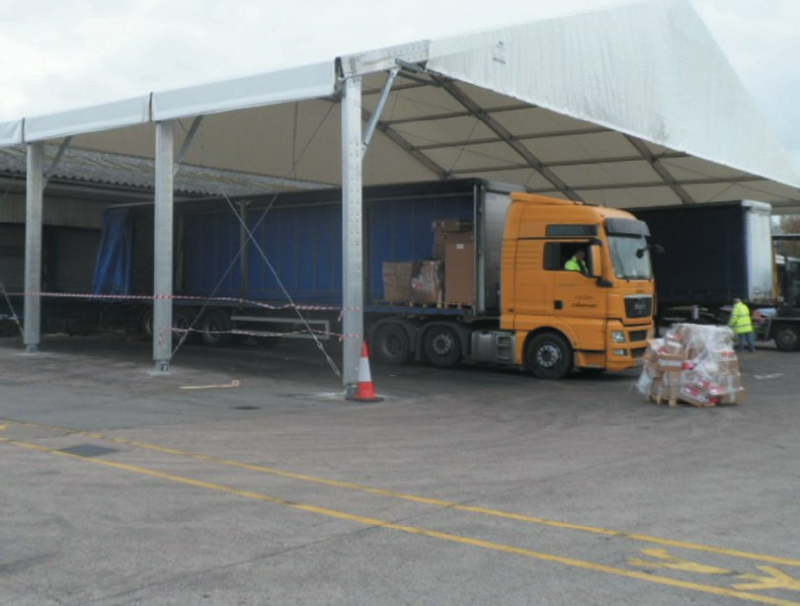 Loading canopy provides cover for people and freight - Factory ...